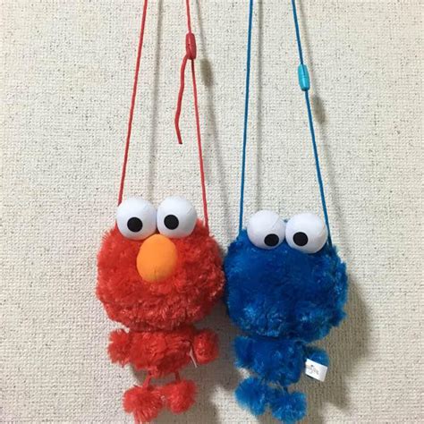 エルモ・クッキーモンスター 小銭入れ メルカリ