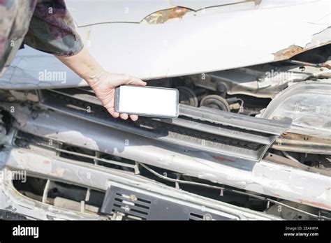 Hand Take Photo Of Crashed Damaged Broken Car Automobile Crash