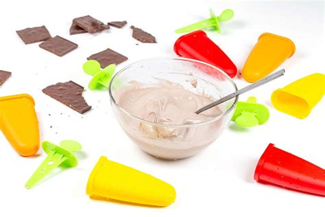 Making Homemade Natural Ice Cream With Milk And Cocoa Powder Creative