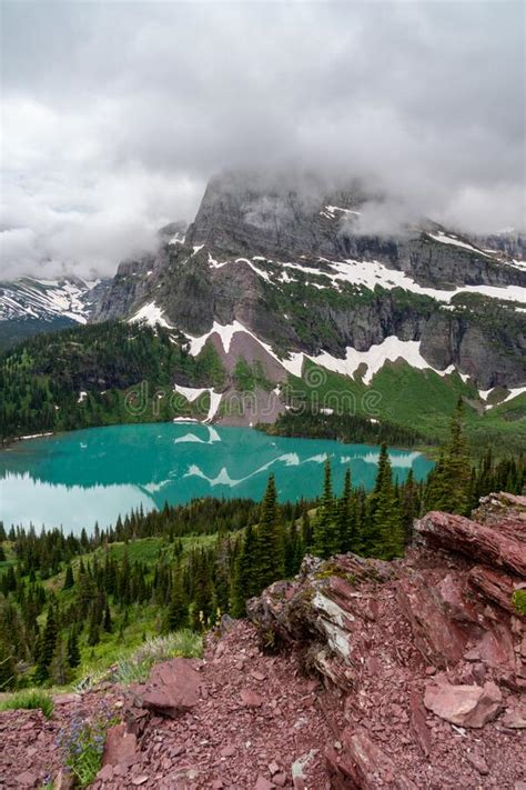 Teal Grinnell Lake Along The Grinnell Glacier Trail In Glacier National