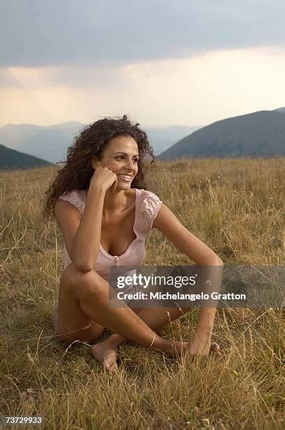 Woman Cross Legged Grass Photos And Premium High Res Pictures Getty