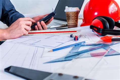 Premium Photo Closeup Shot Of An Architectengineer Analyzing A Blueprints