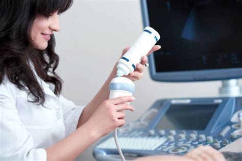 Female Doctor Squeezing Special Gel From Tube To Procedure Newcastle