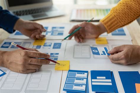 A Team Of Ux Designers Works On A New Website Layout Plan Mobile Web