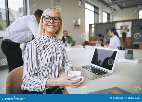 Smiling Young Businesswoman Sitting In An Office Boardroom Drink Stock Image Image Of Girl