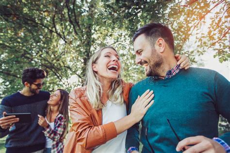 Group Of Smiling Friends Outdoors In Park Stock Image Image Of Nature