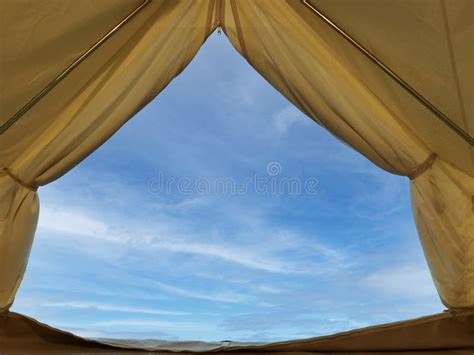View From Inside The Camping Tent Lying Down Lookout To The Blue Sky