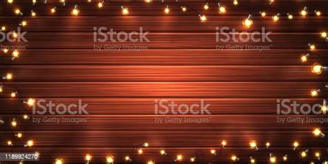 크리스마스 조명입니다 나무 질감 배경에 Led 전구의 빛나는 화환을 빛나는 Xmas 새해 인사말 카드 또는 포스터에 대한