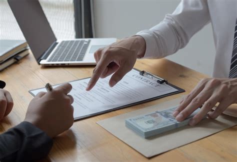 Premium Photo Cropped Image Of Businessman With Colleague In Office