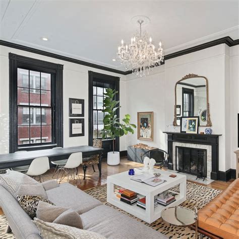 White Walls Black Trim Wood Floor Black And White Living Room