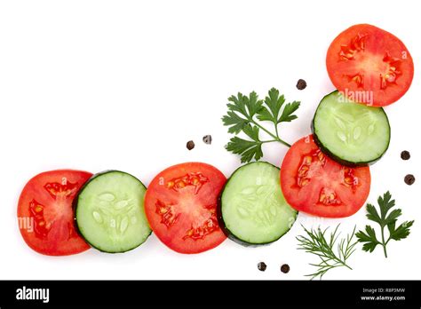 Tomato And Cucumber Slice With Parsley Dill And Peppercorns Isolated On White Background With