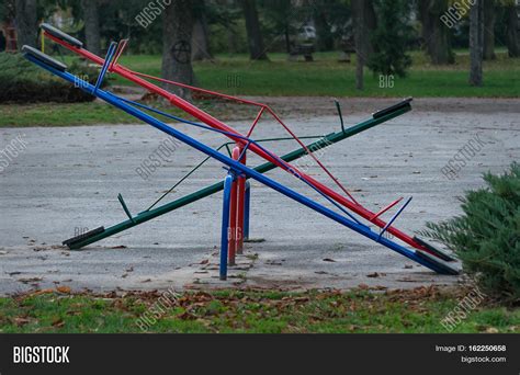 See Saw Teeter Totter Image And Photo Free Trial Bigstock