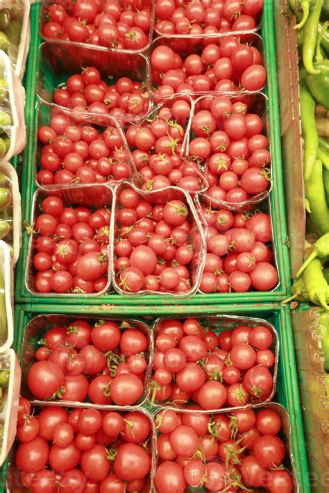 Red Color Small Tomato On Table Stock Photo At Vecteezy