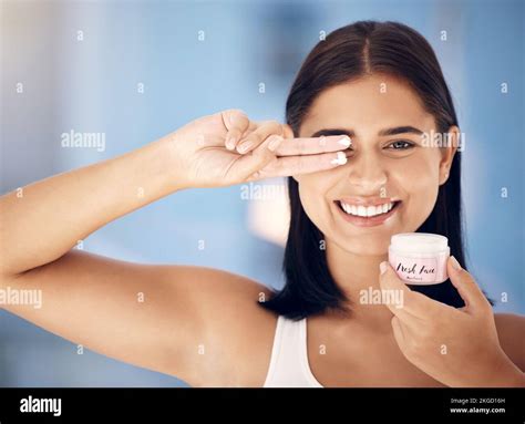 Skincare Beauty And Woman With Cream In Bathroom For Morning Routine