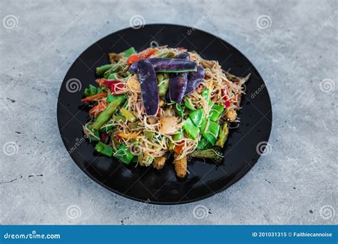 Plant Based Food Vegan Stir Fry With Vermicelli Noodles Snowpeas And