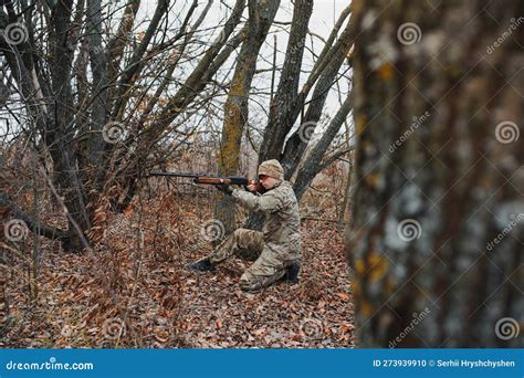 Hunter In Uniform With A Hunting Rifle Hunting Concept Stock Photo Image Of Shotgun Winter