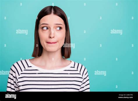 Photo Of Nervous Anxious Lady Look Side Empty Space Bite Lip Wear