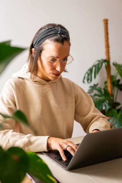 Premium Photo Girl Working At Home Girl Typing On The Computer With