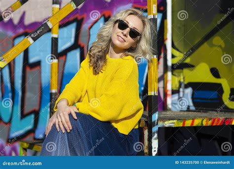 Happy Brightly Dressed Stylish Young Blond Woman In Sunglasses Stock