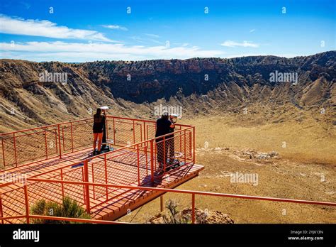 Tourists Visit The Meteor Crater And Barringer Space Museum Winslow