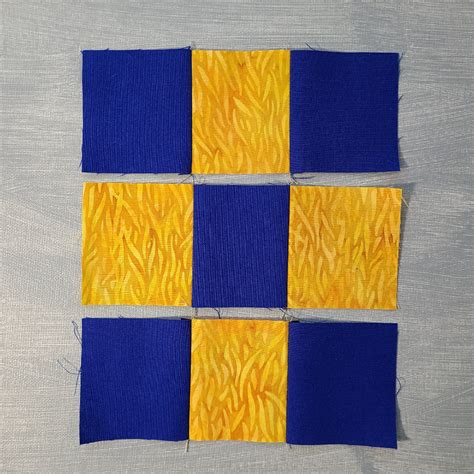Devoted Quilter Playing With Nine Patch Blocks