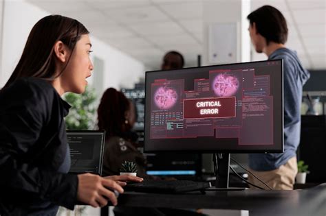 Premium Photo Asian Software Developer Writing Html Code Encountering Hacking Alert On