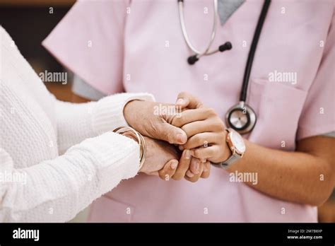 Support Empathy And Nurse Holding Hands With Patient For Compassion