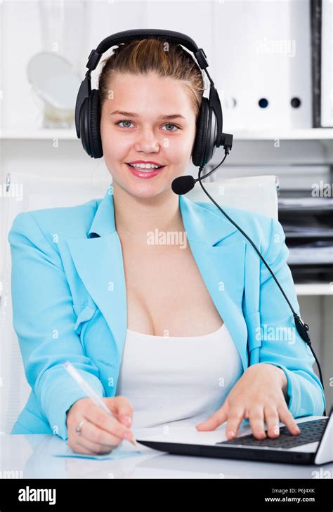Portrait Of Dispatcher Female Which Is Talking With Client In The