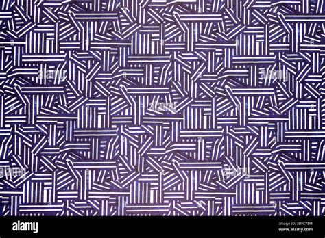 This Image Features A Striking Geometric Pattern Composed Of Intersecting And Overlapping Lines