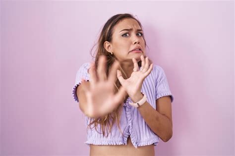 Premium Photo Young Hispanic Woman Standing Over Pink Background