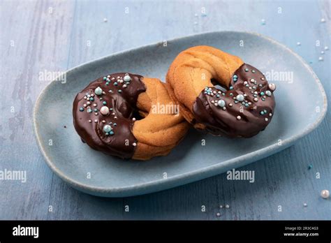 Vegan Shortbread Cookies With Raspberry Jam Dipped In Chocolate Icing