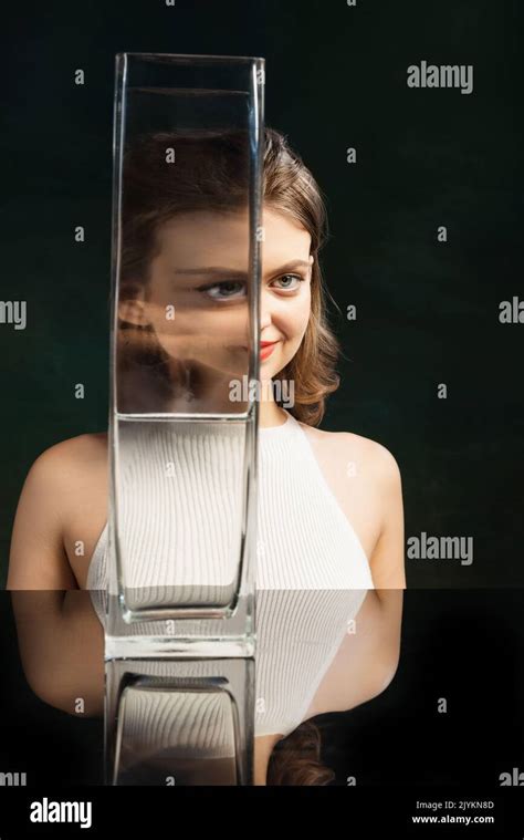 Surreal Art Photography Young Girls Face Through Glass Vase Over Dark