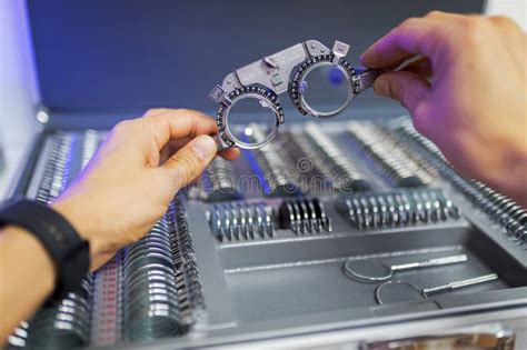 Optician Hands Choose Lenses From Set To Correct Patient S Vision Stock