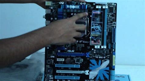 Unboxing the ASUS P7P55D-E PRO LGA1156 SLI/CrossfireX Motherboard - YouTube