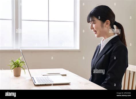 Female Job Hunter Interviewing Online With A Computer Stock Photo Alamy