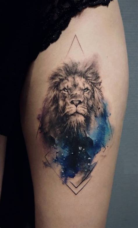 A Woman S Thigh With A Watercolor Tattoo Of A Lion On The Side