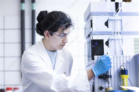Scientist Operating Laboratory Equipment Stock Image F042 8461