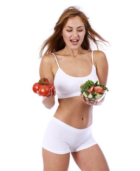 Mujer Rubia Hermosa En La Ropa Blanca De La Aptitud Foto De Archivo