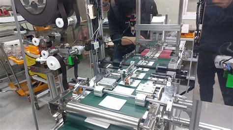 자석 인쇄 광고지 책자 등 자석 붙히는 자동화 기계