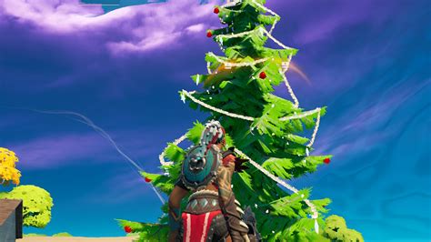 Fortnite Danser près de différents sapins de Noël défi saison 5