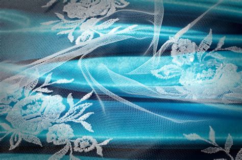 紋理 背景 圖案花邊白色織物花邊織物製成的花朵絲綢面料的藍色背景賀卡桌面牆紙設計器的螢幕保護裝置程式背景 照片檔及更多 俄羅斯 照片 Istock