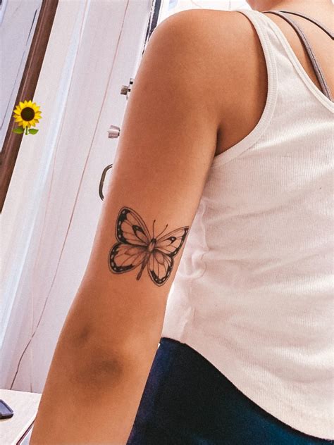 Elegant Butterfly Tattoo On The Tricep