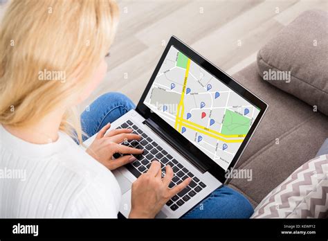 Close Up Of A Woman Using GPS Map With Navigation Pointers On Laptop Stock Photo Alamy