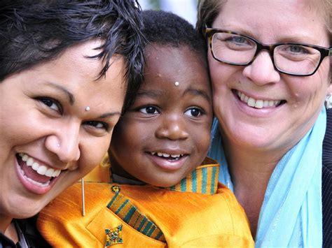 Two Women — One Brown One White — Adopt A Black Son In Post Racial