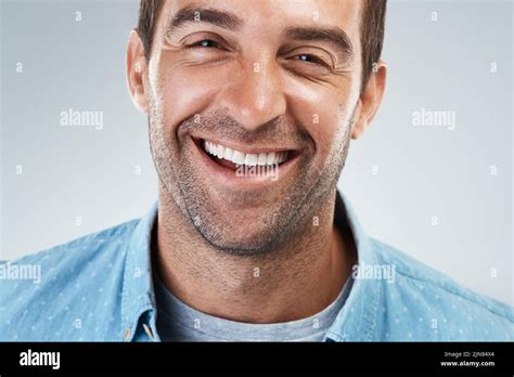 Now Thats A Good Smile Portrait Of A Cheerful Young Man Smiling