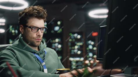 Premium Photo Focused Man Coding Computer Keyboard Night Datacenter Closeup Programer Working