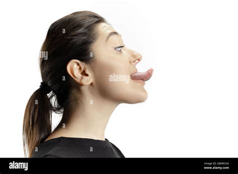 Smiling Girl Opening Her Mouth And Showing The Long Big Giant Tongue