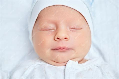 Premium Photo Close Up Of Cute Girl Sleeping On Bed