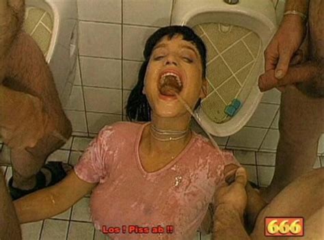 Young Hot Slut Plays Piss And Cum On Her Mouth During Extreme Bukkake Photos