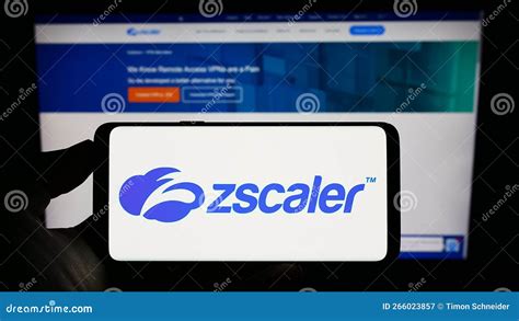 Person Holding Cellphone With Logo Of Us Cloud Security Company Zscaler